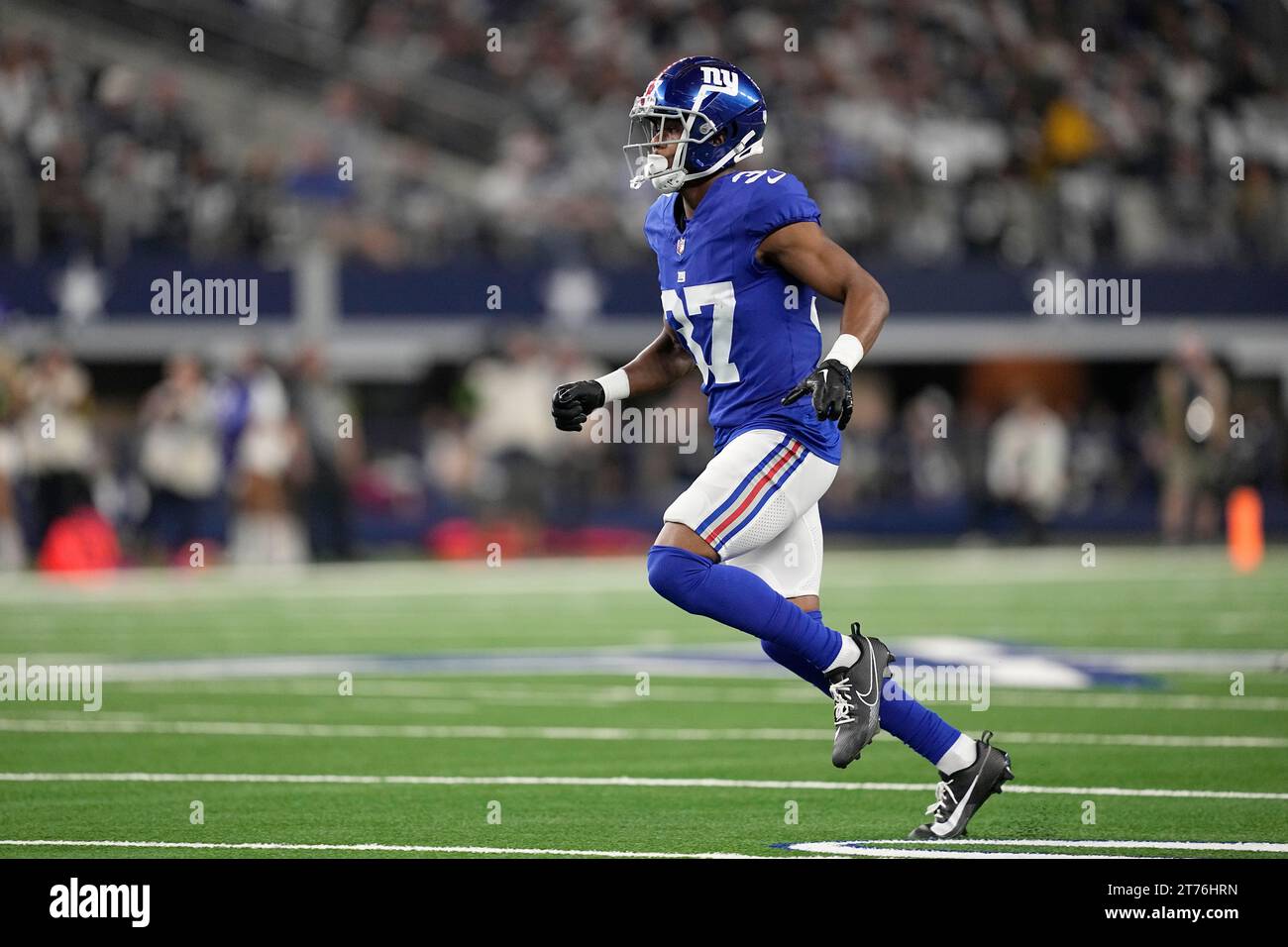 New York Giants cornerback Tre Hawkins III defends during an NFL football game against the ...