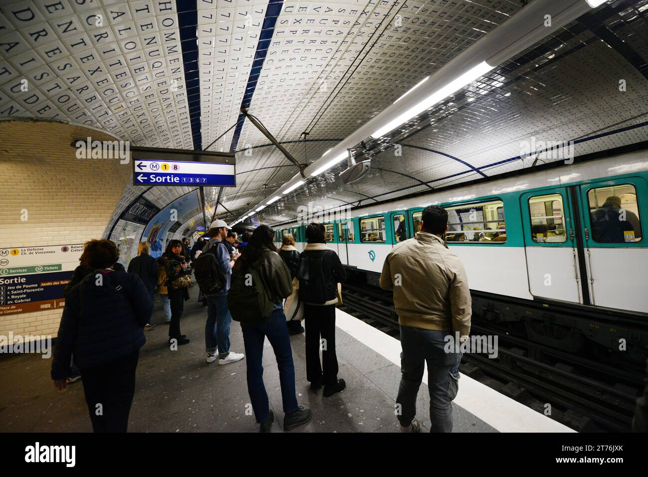 Passengers waiting for the Metro train at the Concorde Metro station in ...
