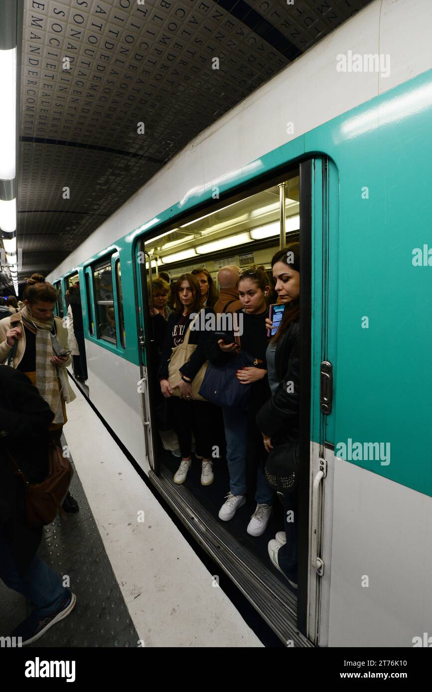 Passengers waiting for the Metro train at the Concorde Metro station in ...