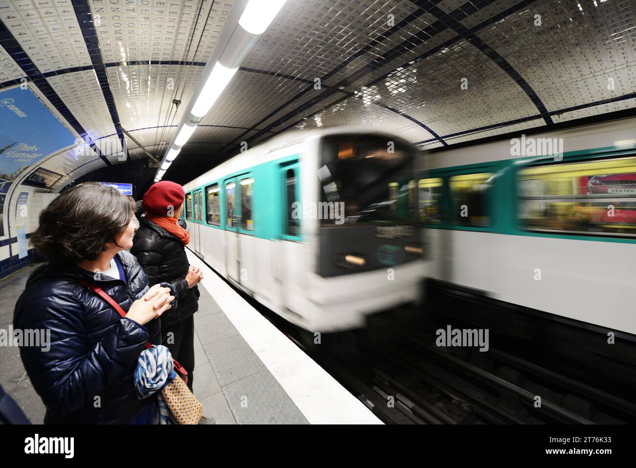 Passengers waiting for the Metro train at the Concorde Metro station in ...