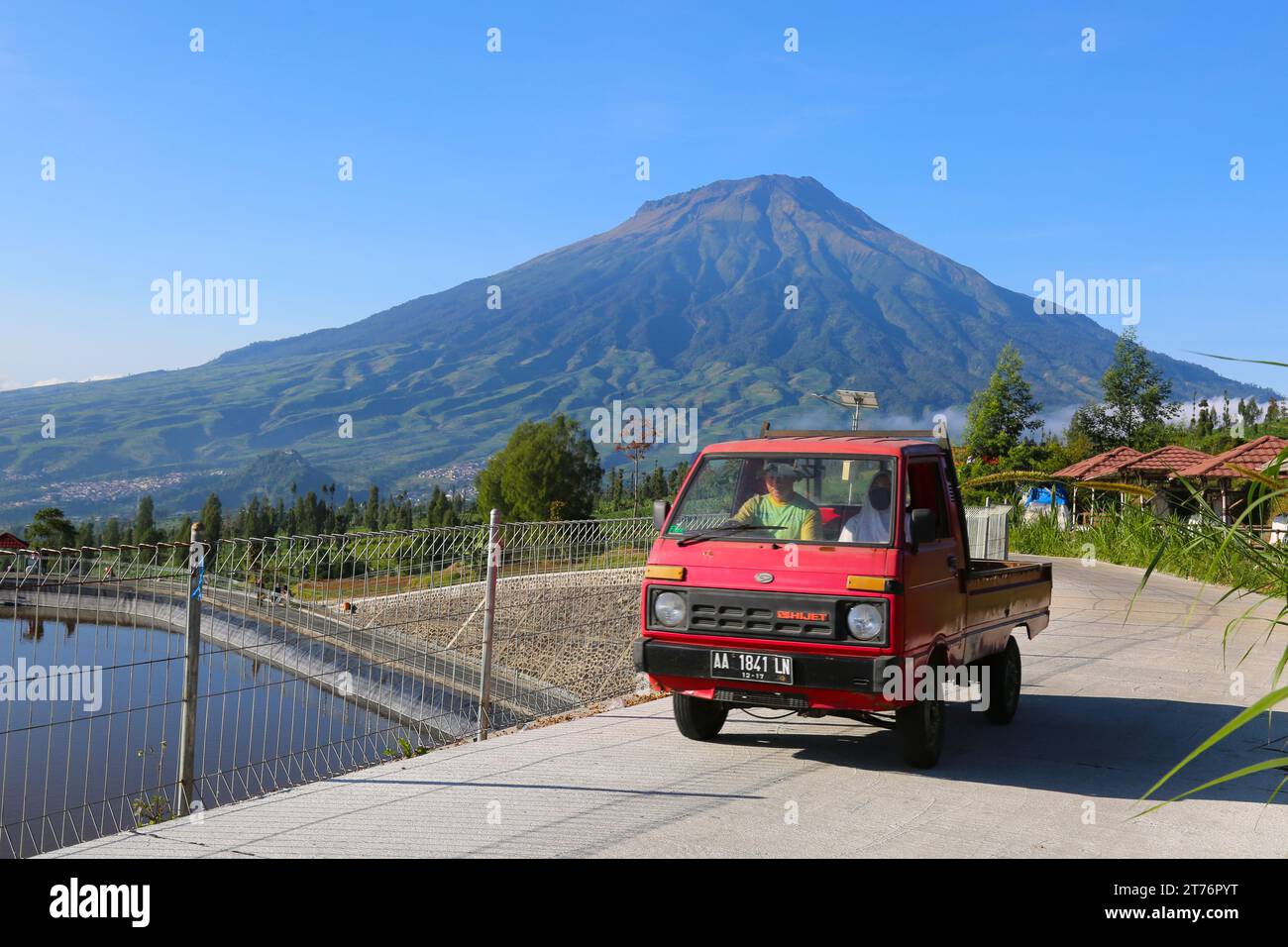 Cars pass by Stock Photo - Alamy