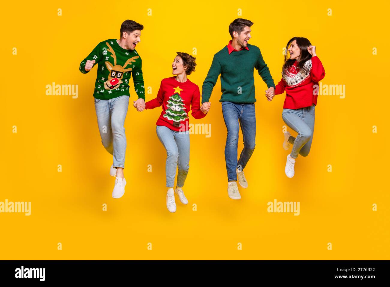 Photo of best buddies lady guy hold hands jumping walking on christmas ...