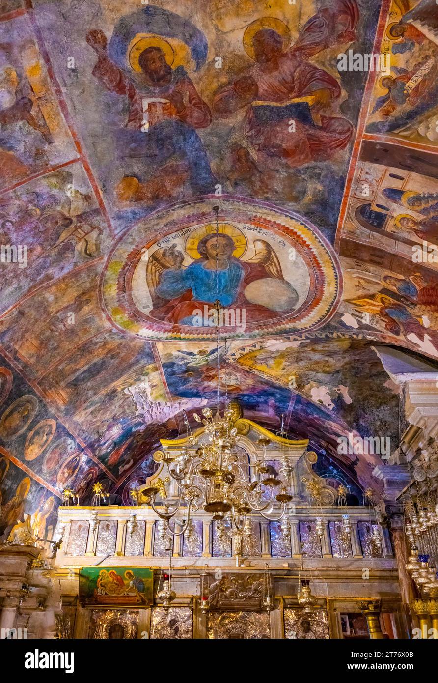 Wall and ceiling paintings adorn the church within the Monastery of ...