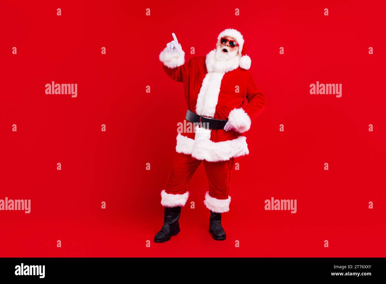 Portrait of ecstatic funny santa claus with white beard in sunglass ...