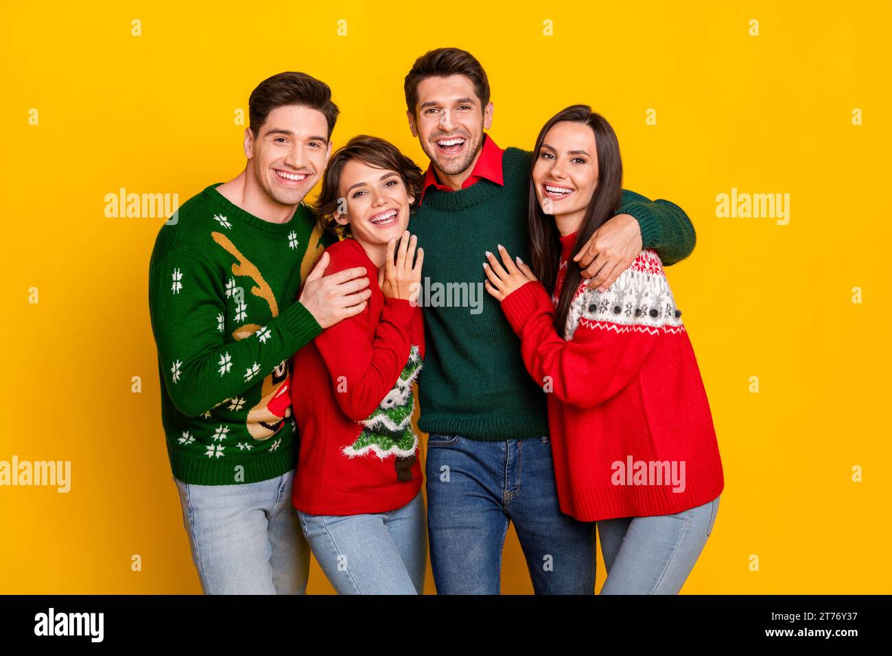 Photo of positive cheerful youth people cuddle together on christmas ...