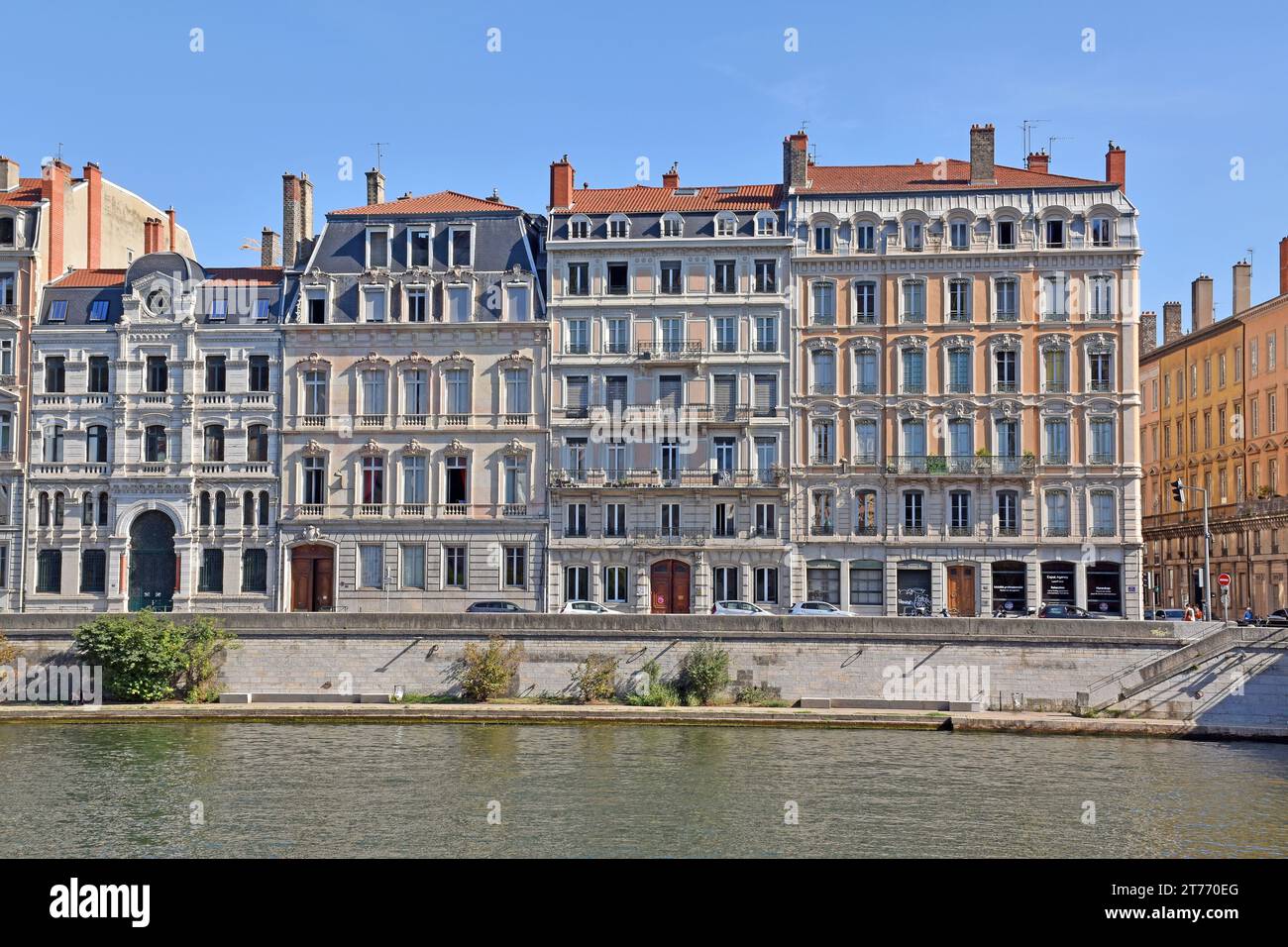 Terraces of apartment buildings on the left bank of the river Sâone ...