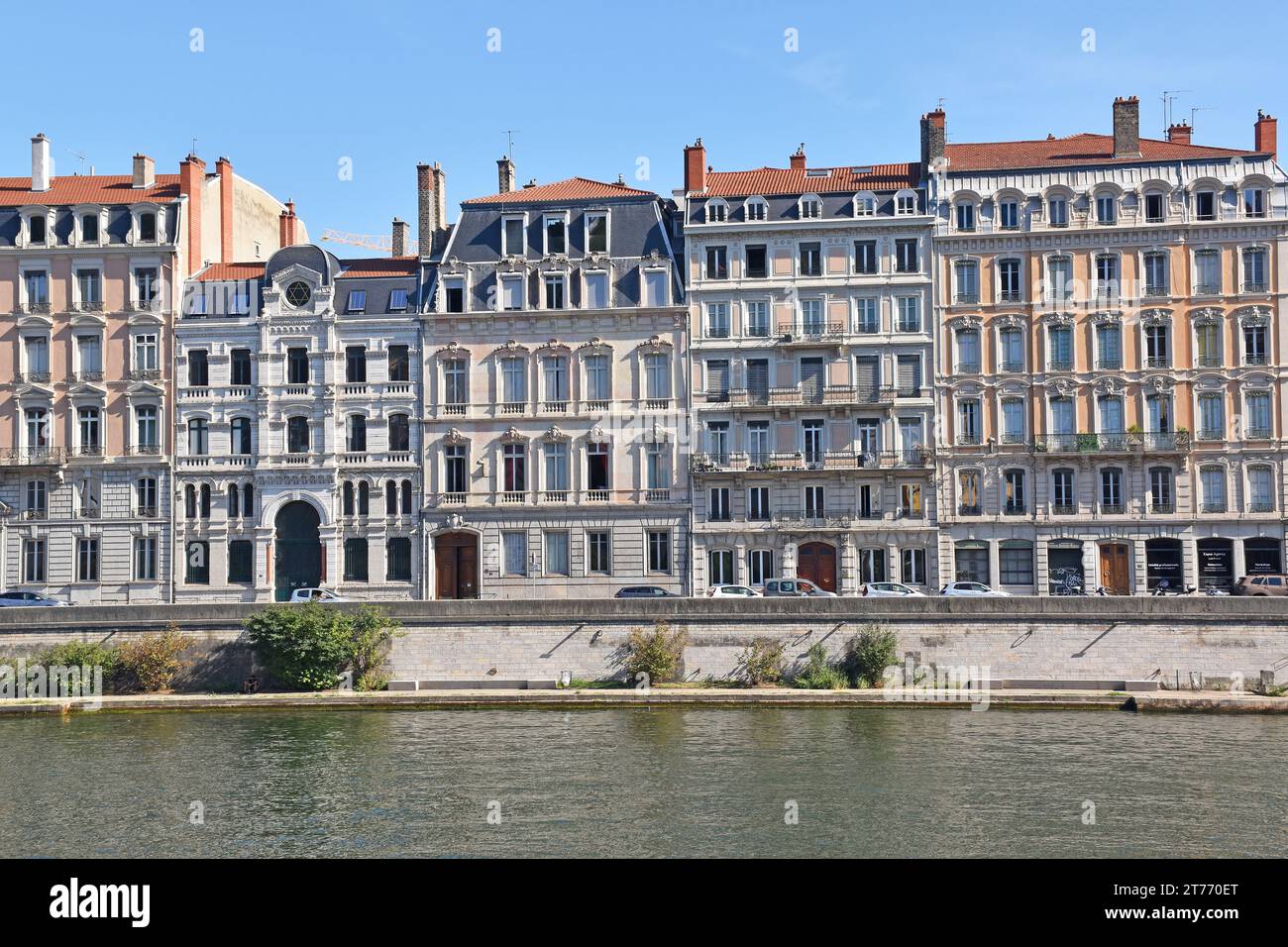 Terraces of apartment buildings on the left bank of the river Sâone ...
