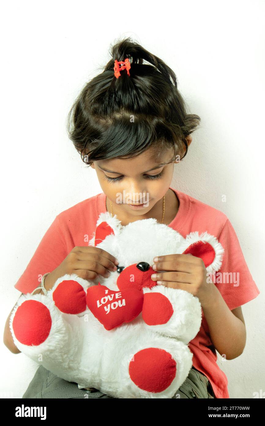 little girl holding teddy bear Stock Photo - Alamy