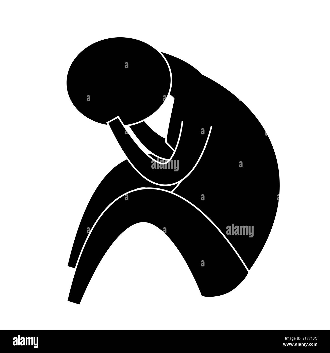 A man sits with his head bowed on his hands and knees. The silhouette ...