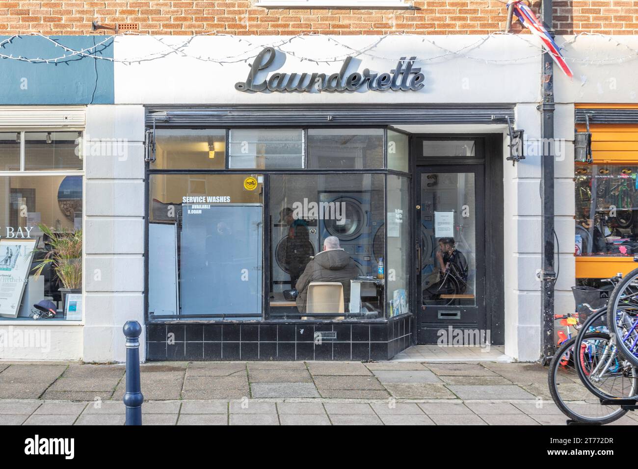 A small launderette on Hythe High Street, Kent, UK Stock Photo - Alamy