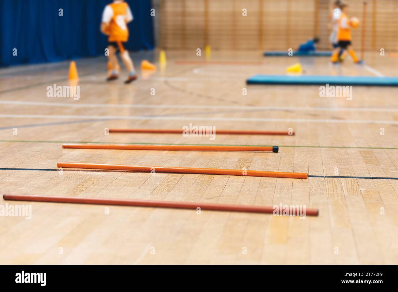 Futsal training field with orange poles yellow cones and red hurdles ...