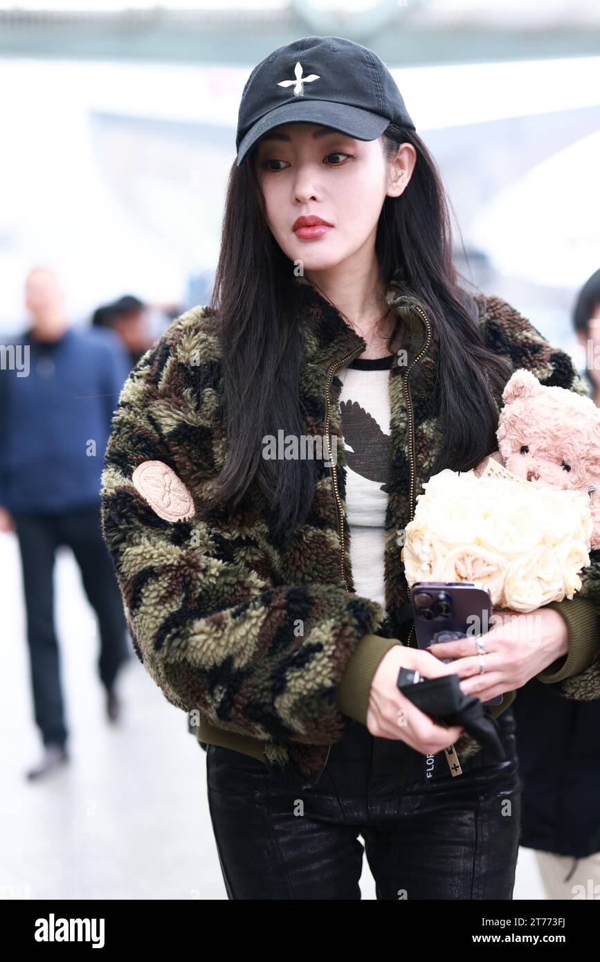 Chinese actress and model Zhang Tian'ai appears at the airport in ...