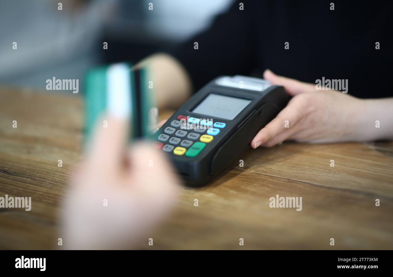Digital Paying for Service via Payment Terminal Stock Photo - Alamy