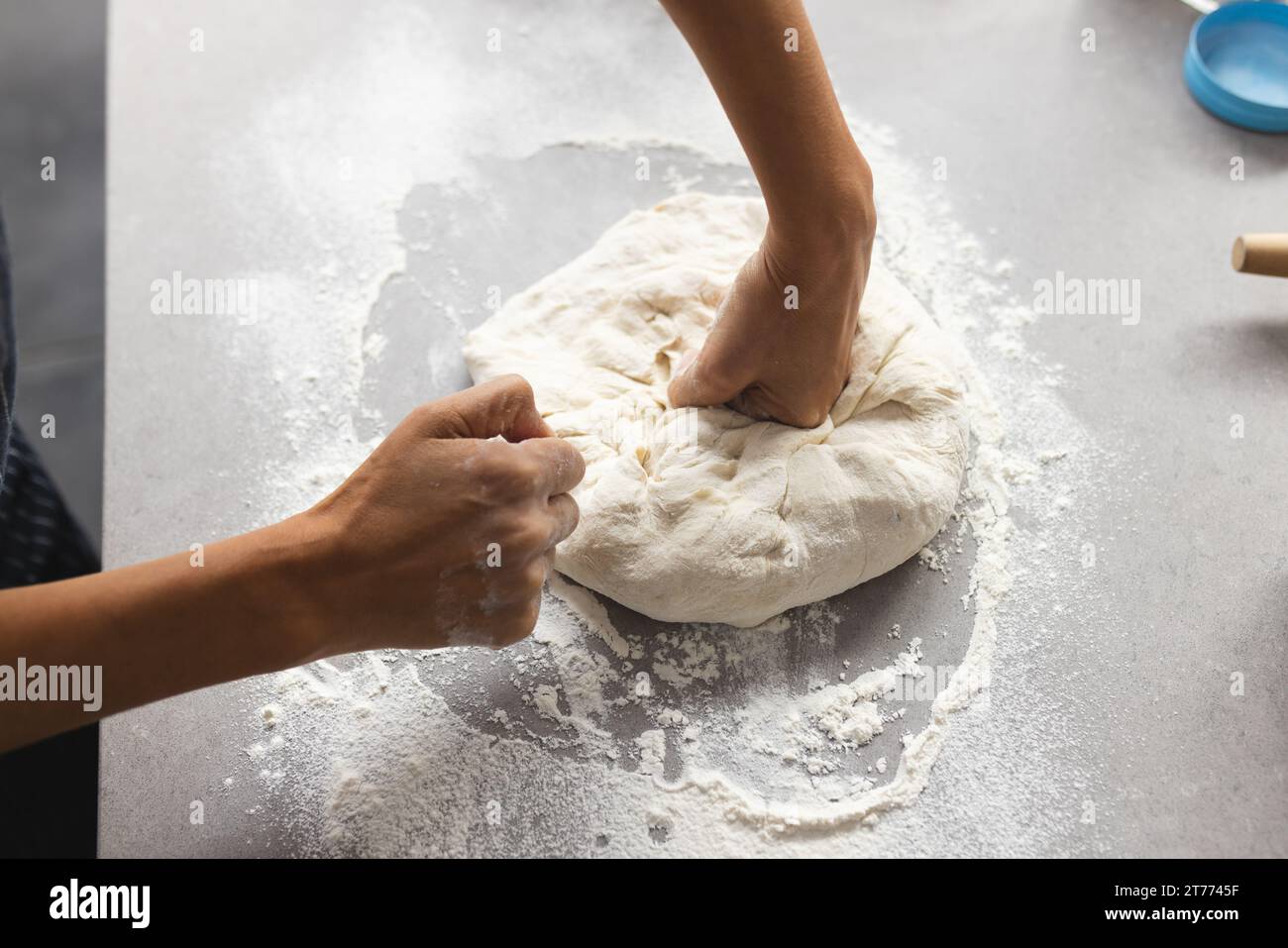Woman hand kneading dough hi-res stock photography and images - Alamy