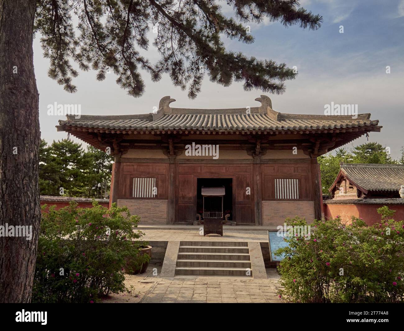A brightly lit, traditional Chinese Nanchan temple hall from the Tang ...