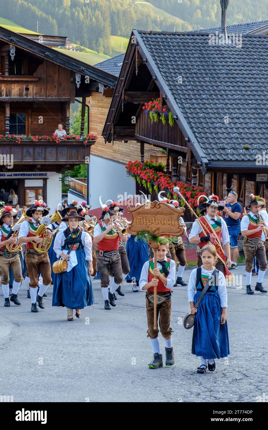 A young boy and girl lead music band from Alpbach Austria, in ...
