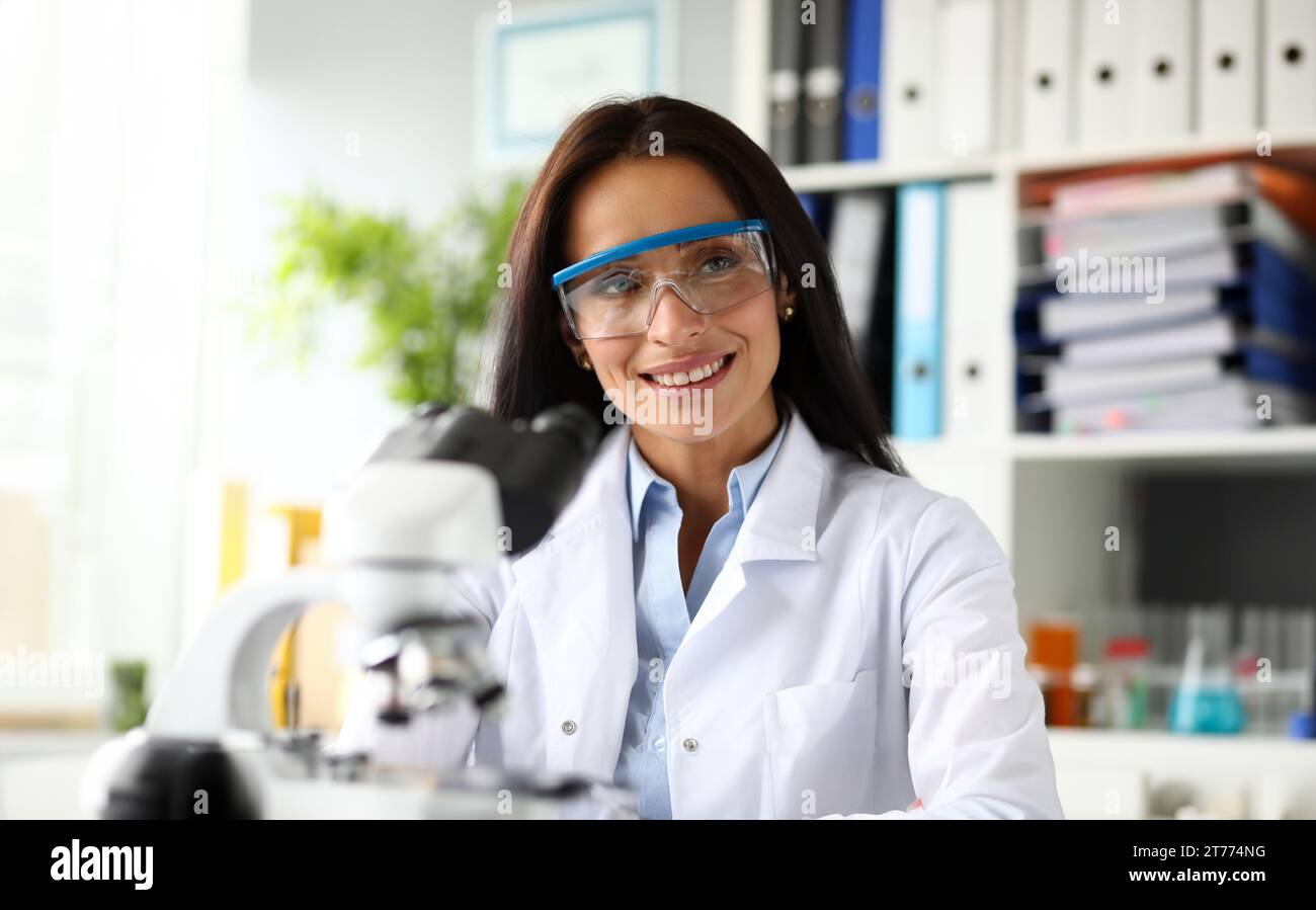 Positive female lab assistant hi-res stock photography and images - Alamy