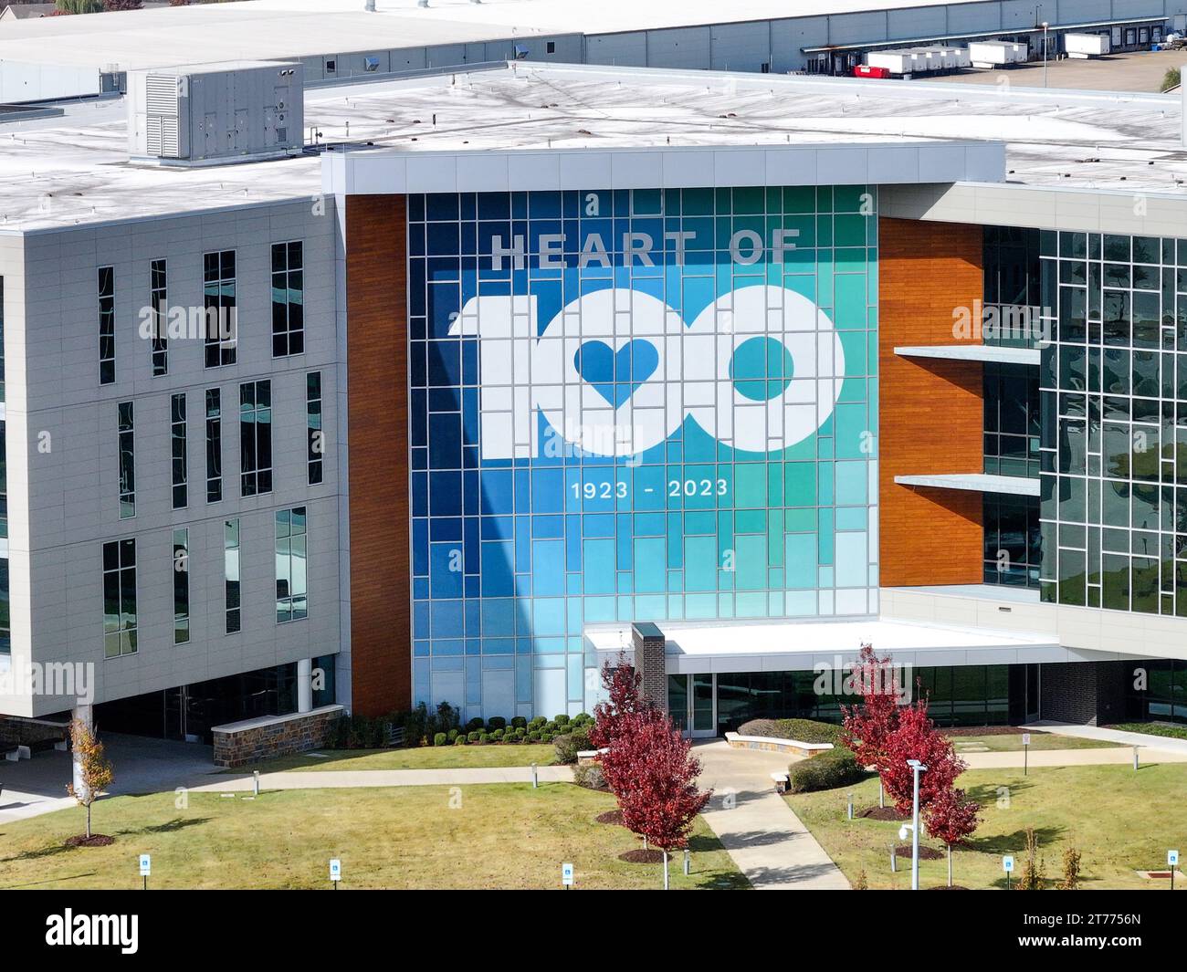 This is a photo of a building with two signs, one on the exterior and ...