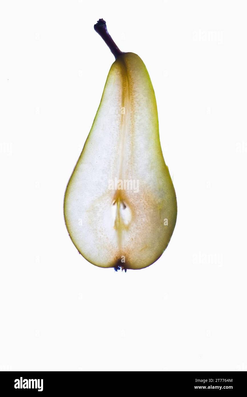 Extreme close up of a sliced pear against white background Stock Photo ...