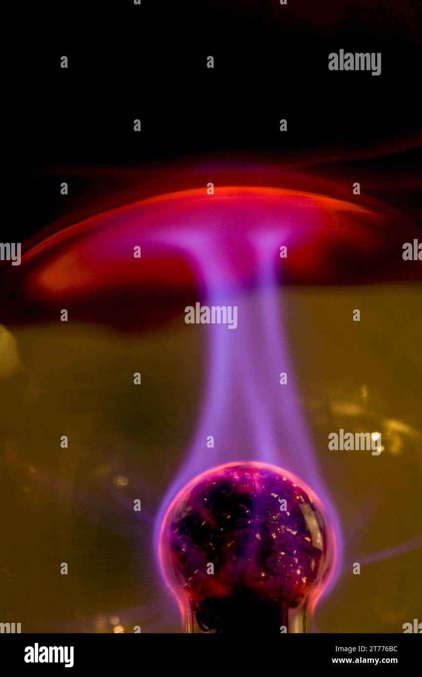 Plasma ball with red purple and pink electrical discharge Stock Photo ...
