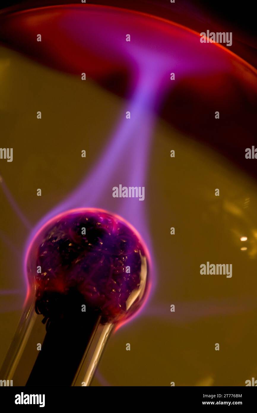 Plasma ball with red purple and pink electrical discharge Stock Photo ...