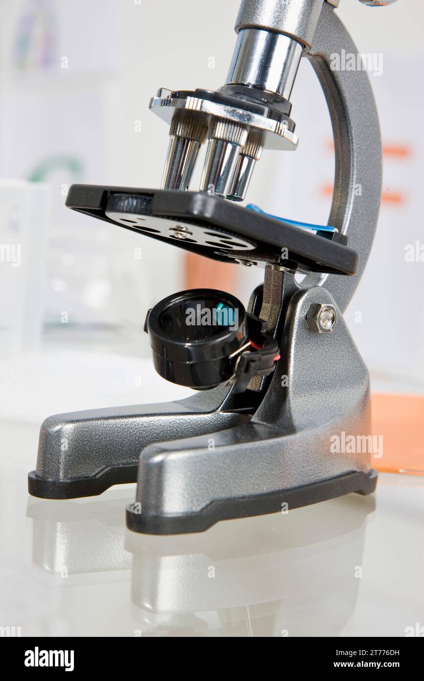 Microscope in chemistry classroom Stock Photo - Alamy