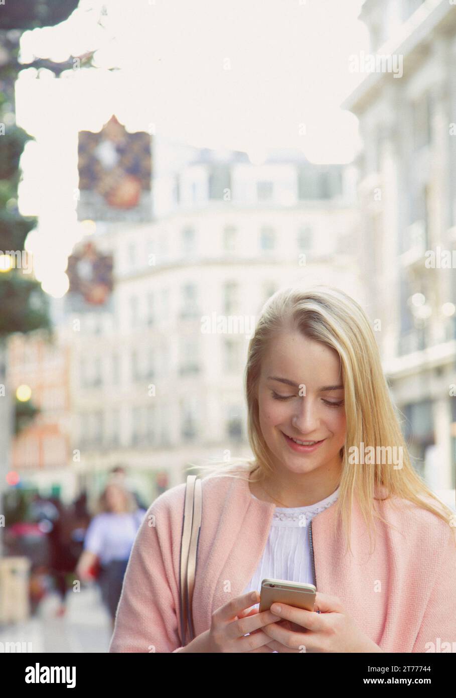 Unrecognizable young woman using smartphone hi-res stock photography and images - Alamy
