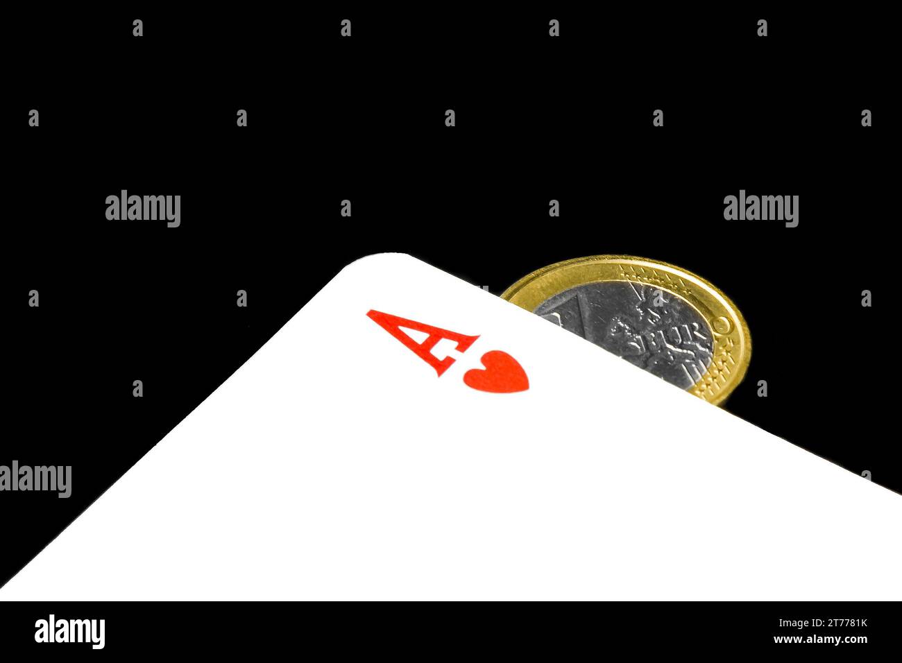 detail of euro coins and playing card on black background Stock Photo ...