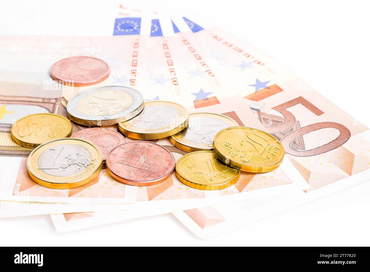 detail of some money euro coins and banknotes on white background Stock ...