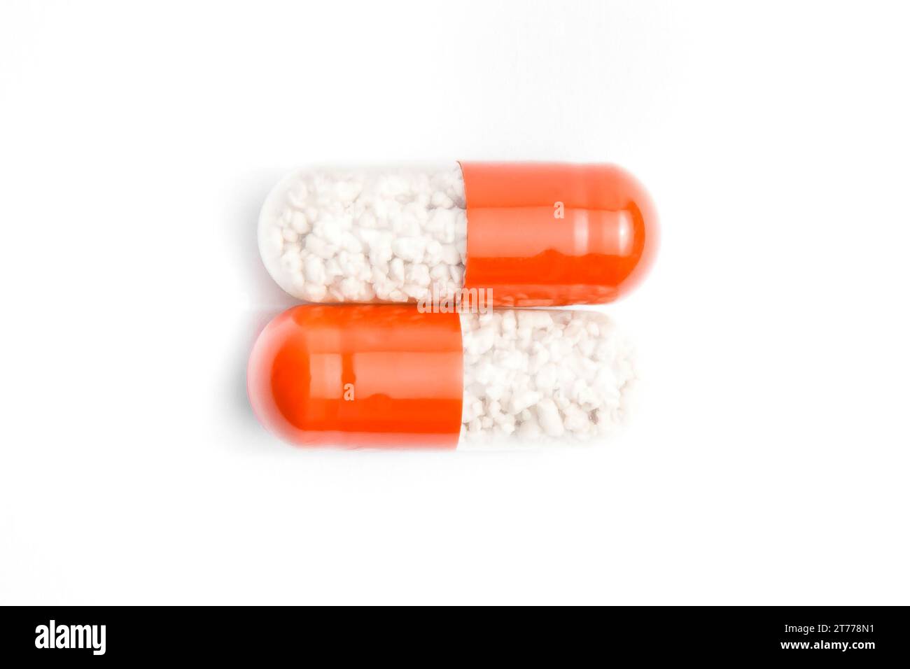 two medical pills isolated on white background Stock Photo - Alamy