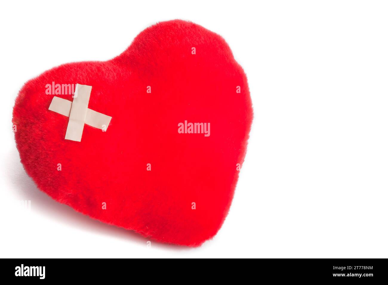 heart of cuddly toys with patch on white background with space for text ...