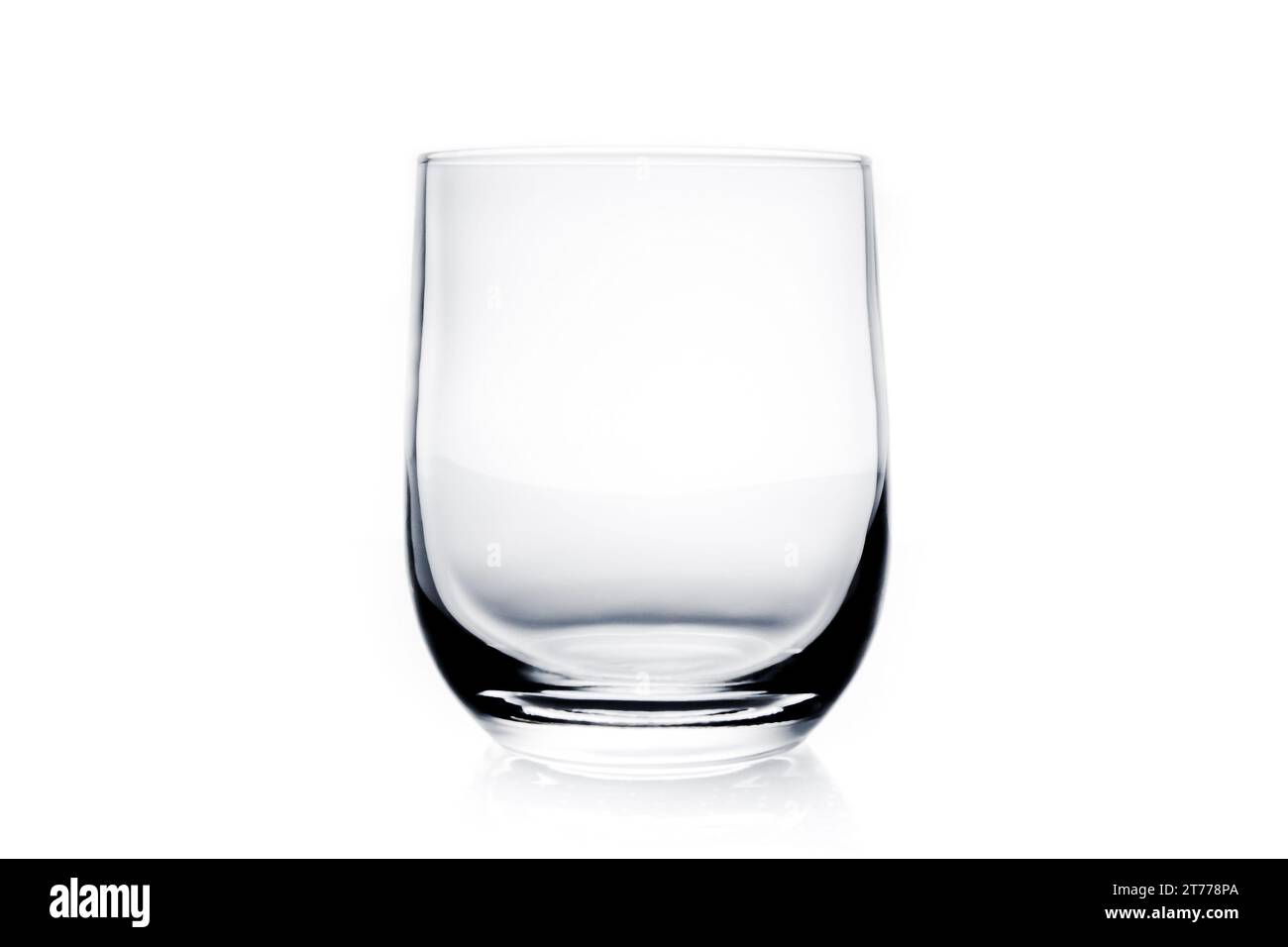 empty water glass on white background Stock Photo - Alamy