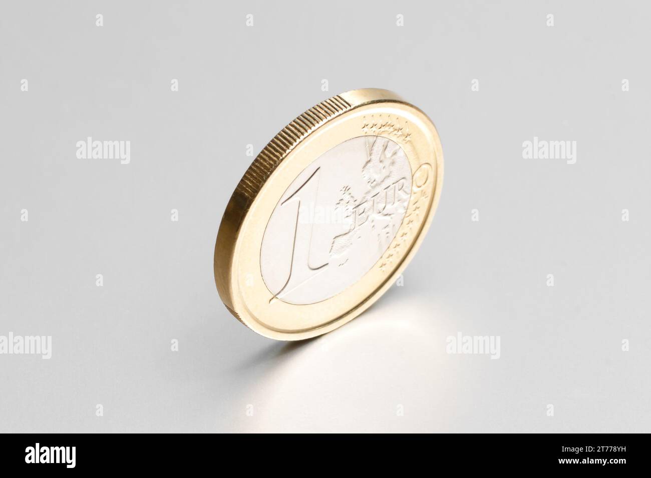 one euro coin on metallic background Stock Photo - Alamy
