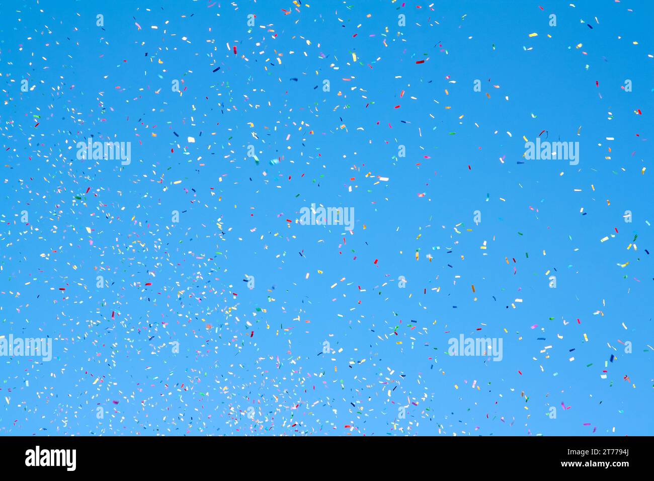 Red confetti in blue hi-res stock photography and images - Alamy