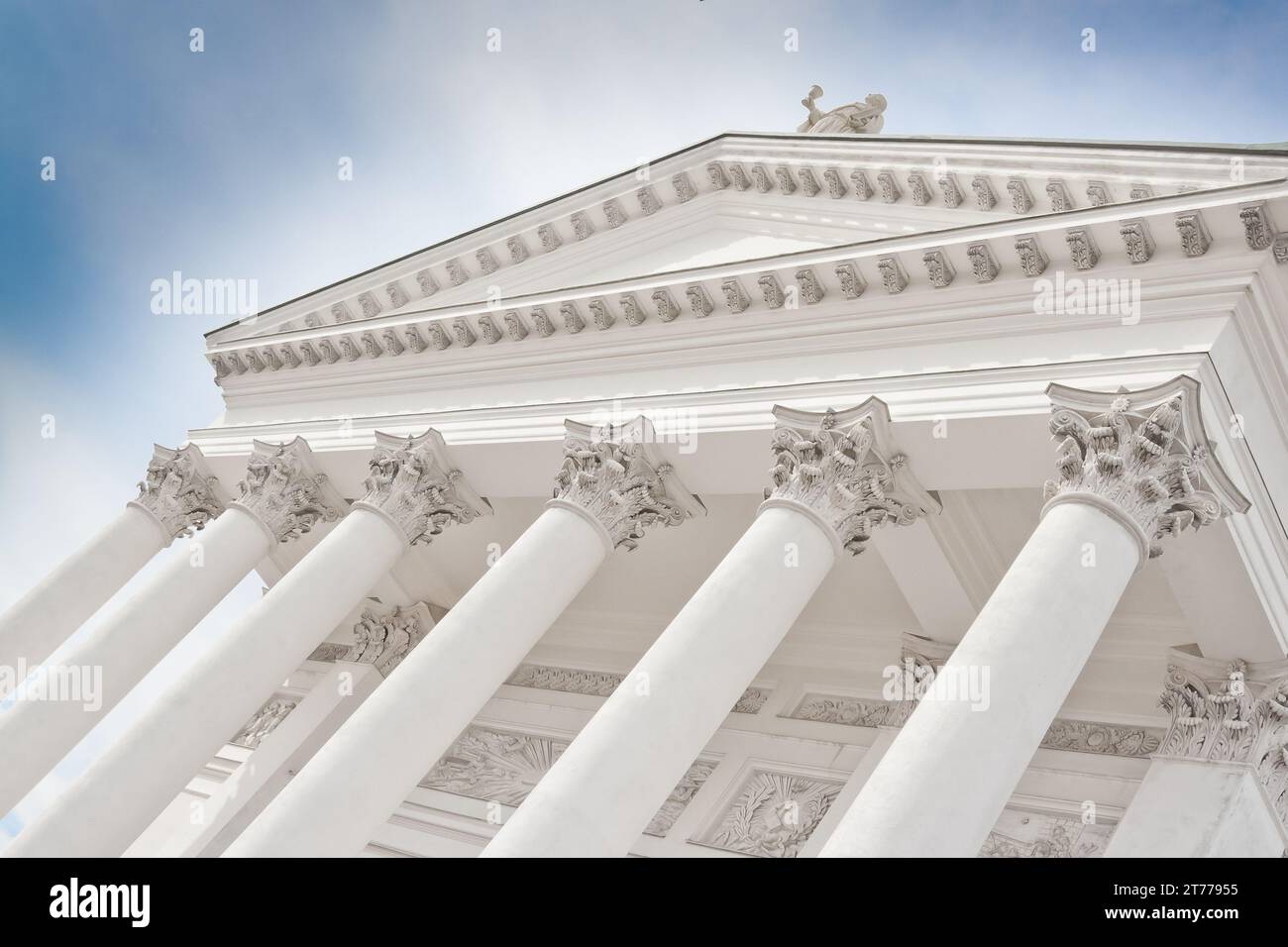 historic columns under blue sky Stock Photo - Alamy