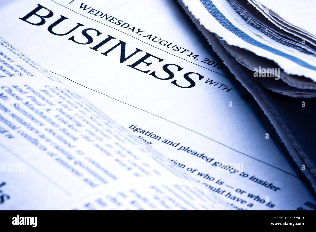 business word on newspaper on table Stock Photo - Alamy