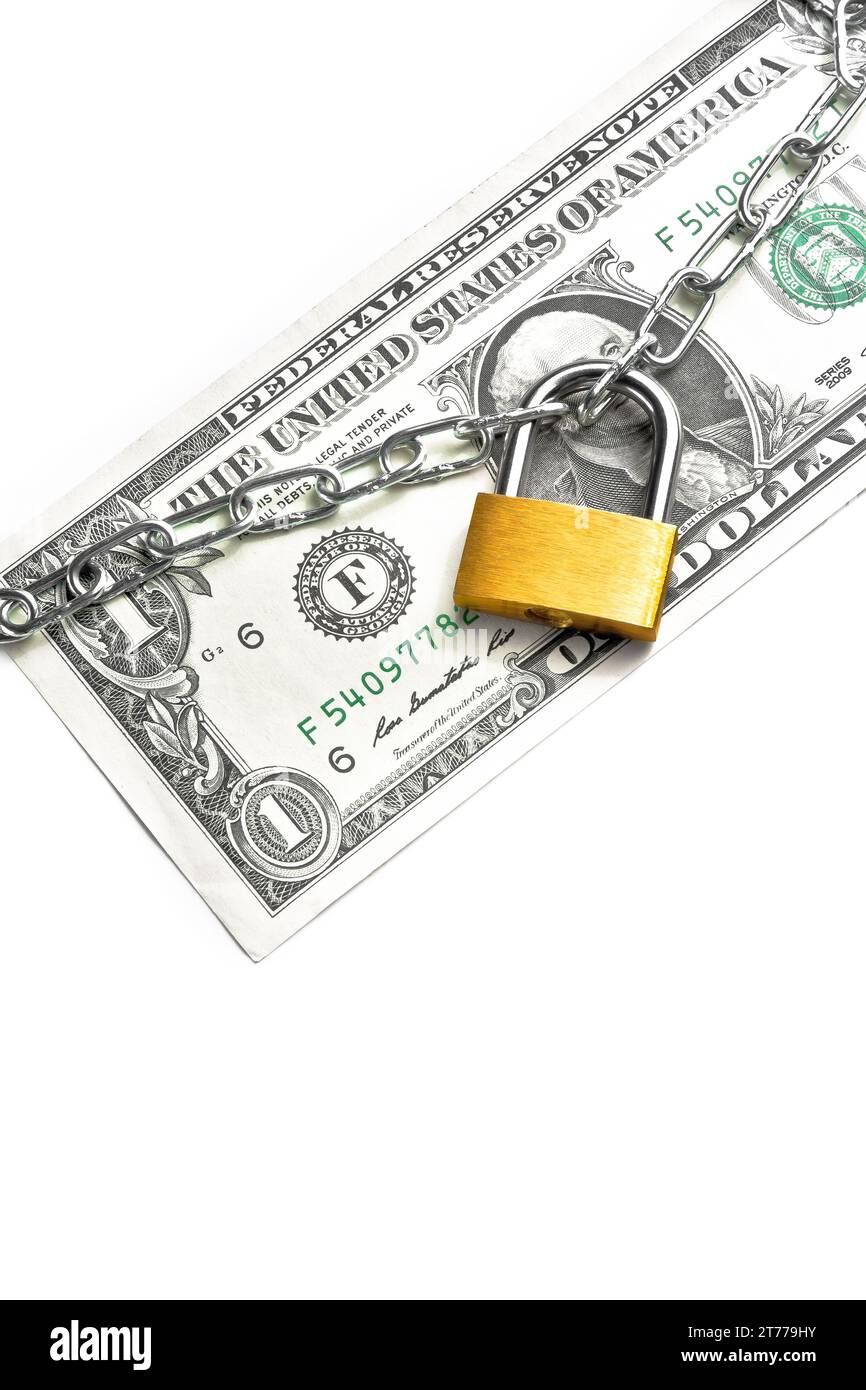 top of view of dollar banknote with lock security and chain on white ...