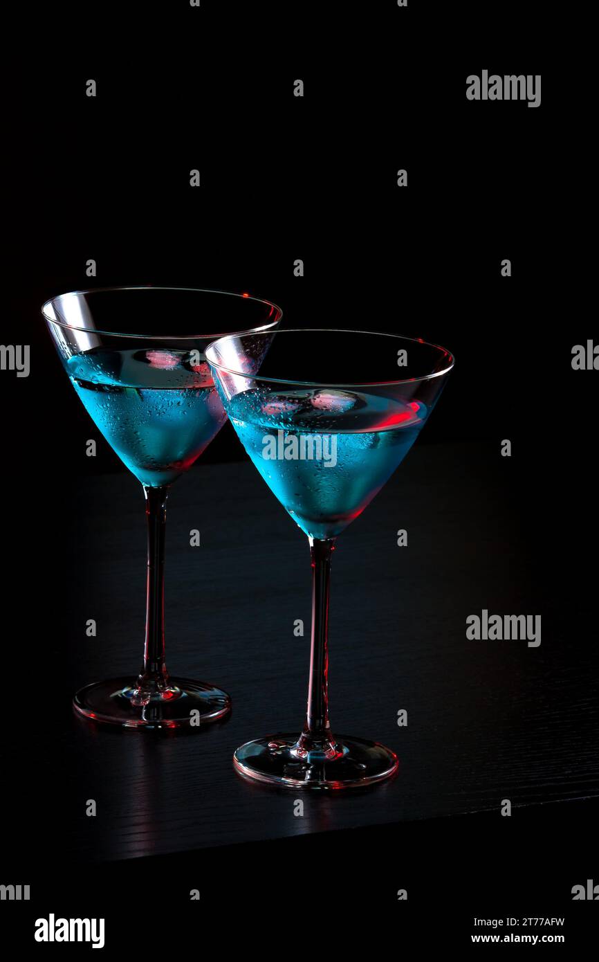 Blue cocktail black background hi-res stock photography and images - Alamy