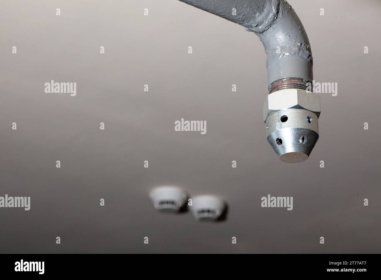 Gas extinguishing pipeline nozzle and smoke detector for fire ...