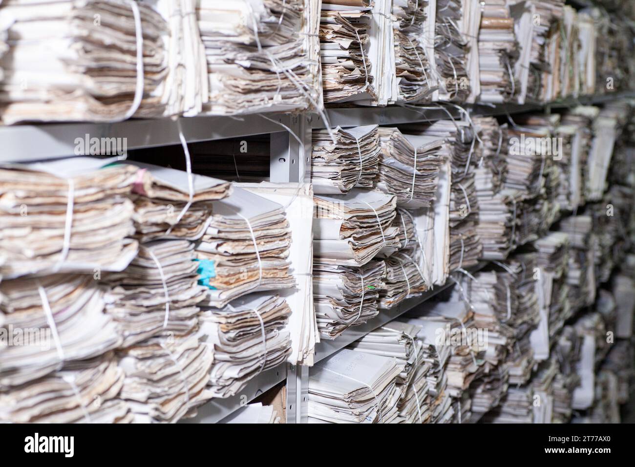 shelves with paper documents. Organized office space with neatly ...