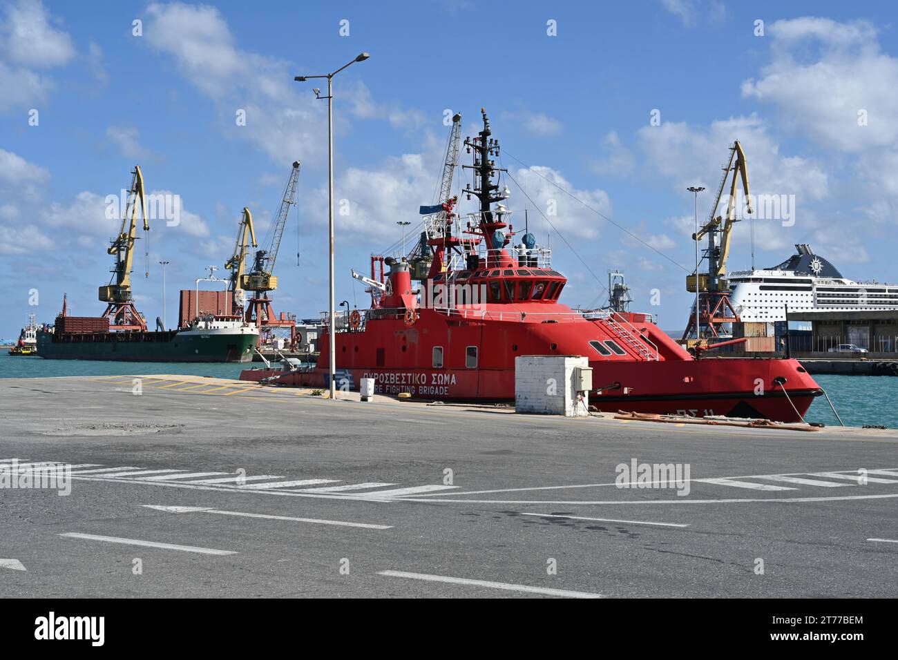 Red fireboat designed for firefighting and fire extinguishing of ...