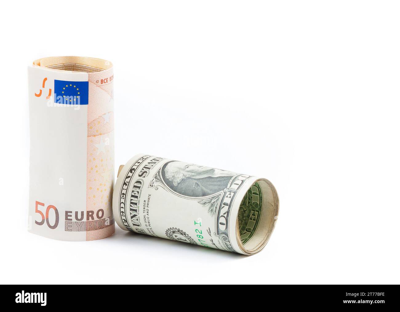 rolled up euro and rolled up dollars banknote on white background with ...