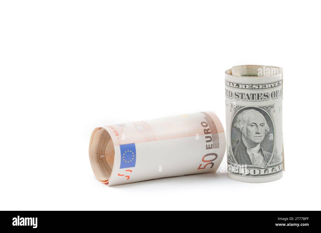 rolled up euro and rolled up dollars banknote on white background with ...