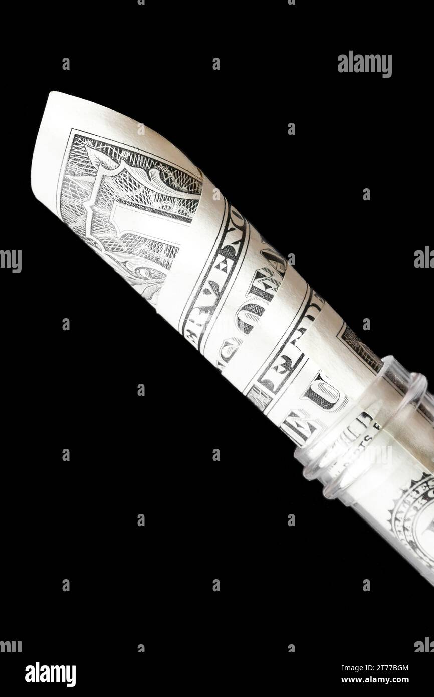 dollar banknote in graduated test tube with space for text, the cost of ...