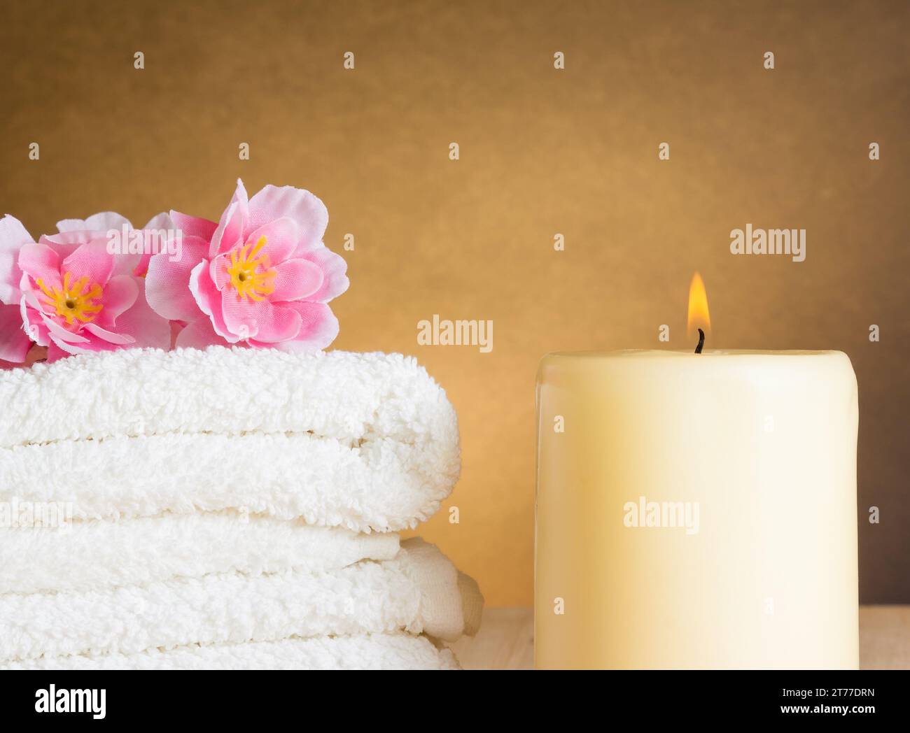 Spa massage border background with towel stacked and candle, warm ...