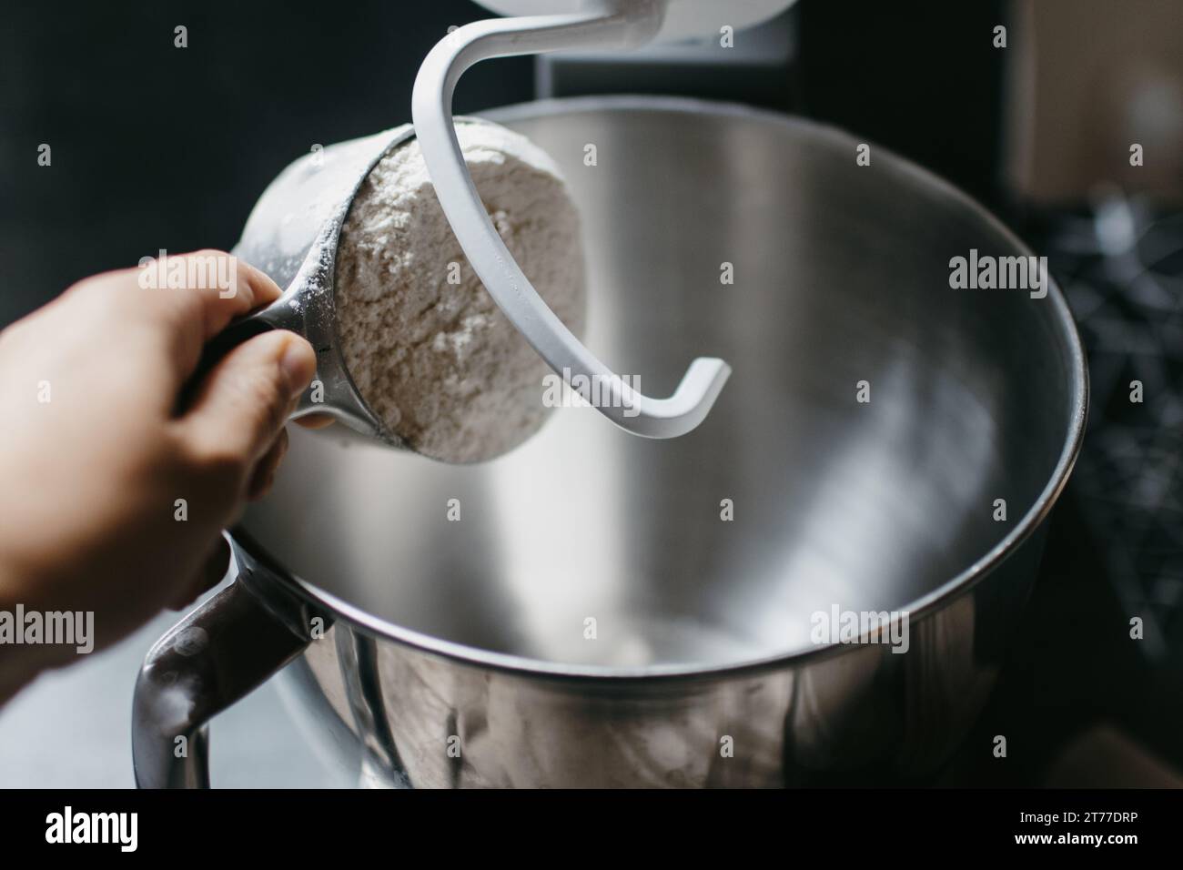 Hand whisking ingredients in hi-res stock photography and images - Alamy