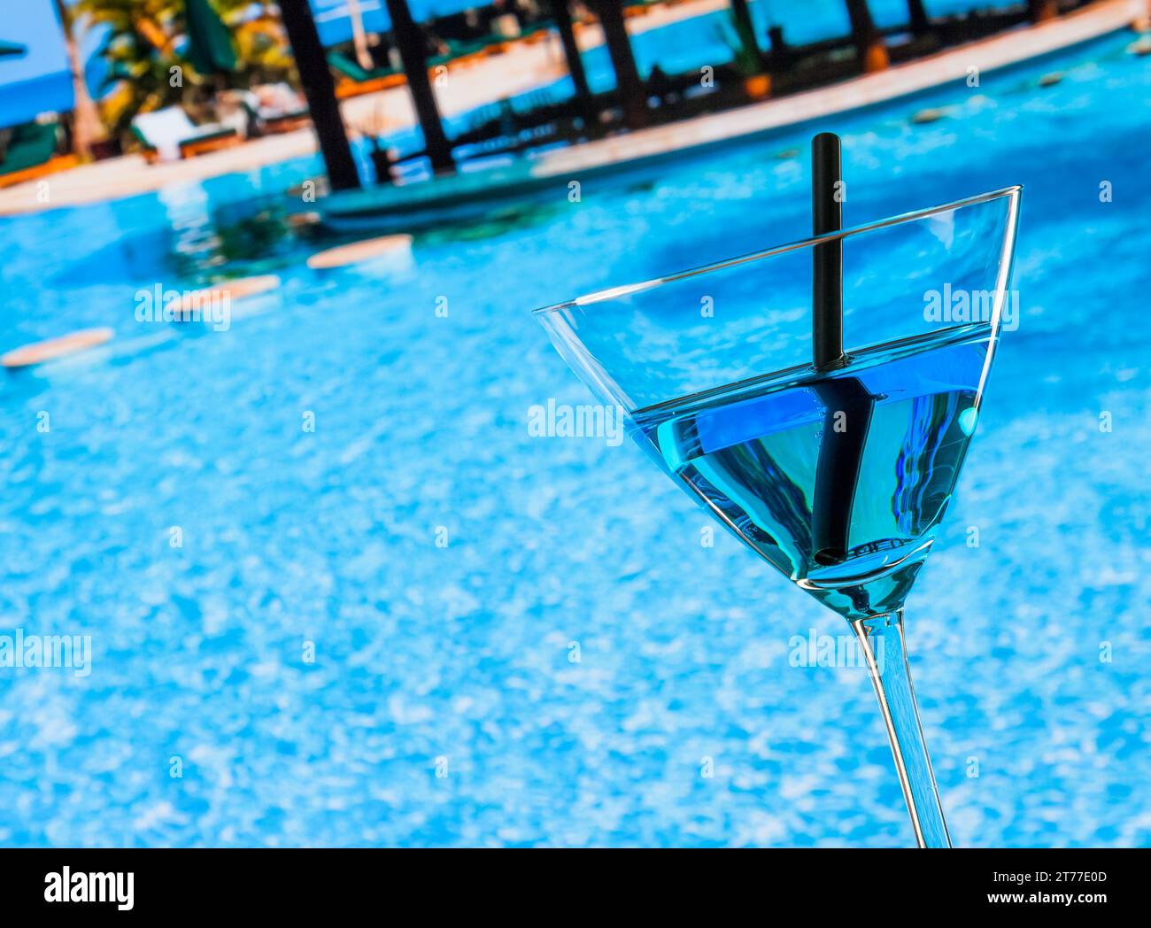 Cold blue cocktail on the background of the pool Stock Photo - Alamy