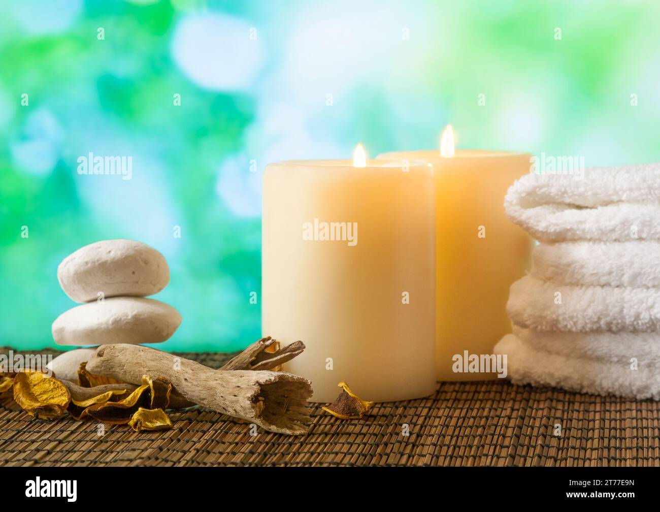 Spa massage border background with towel stacked, candles and perfumed ...