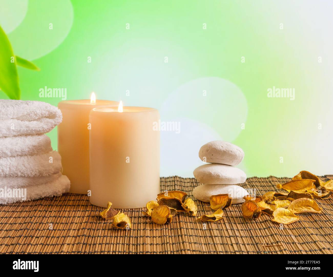 Spa massage border background with towel stacked, candles and perfumed ...