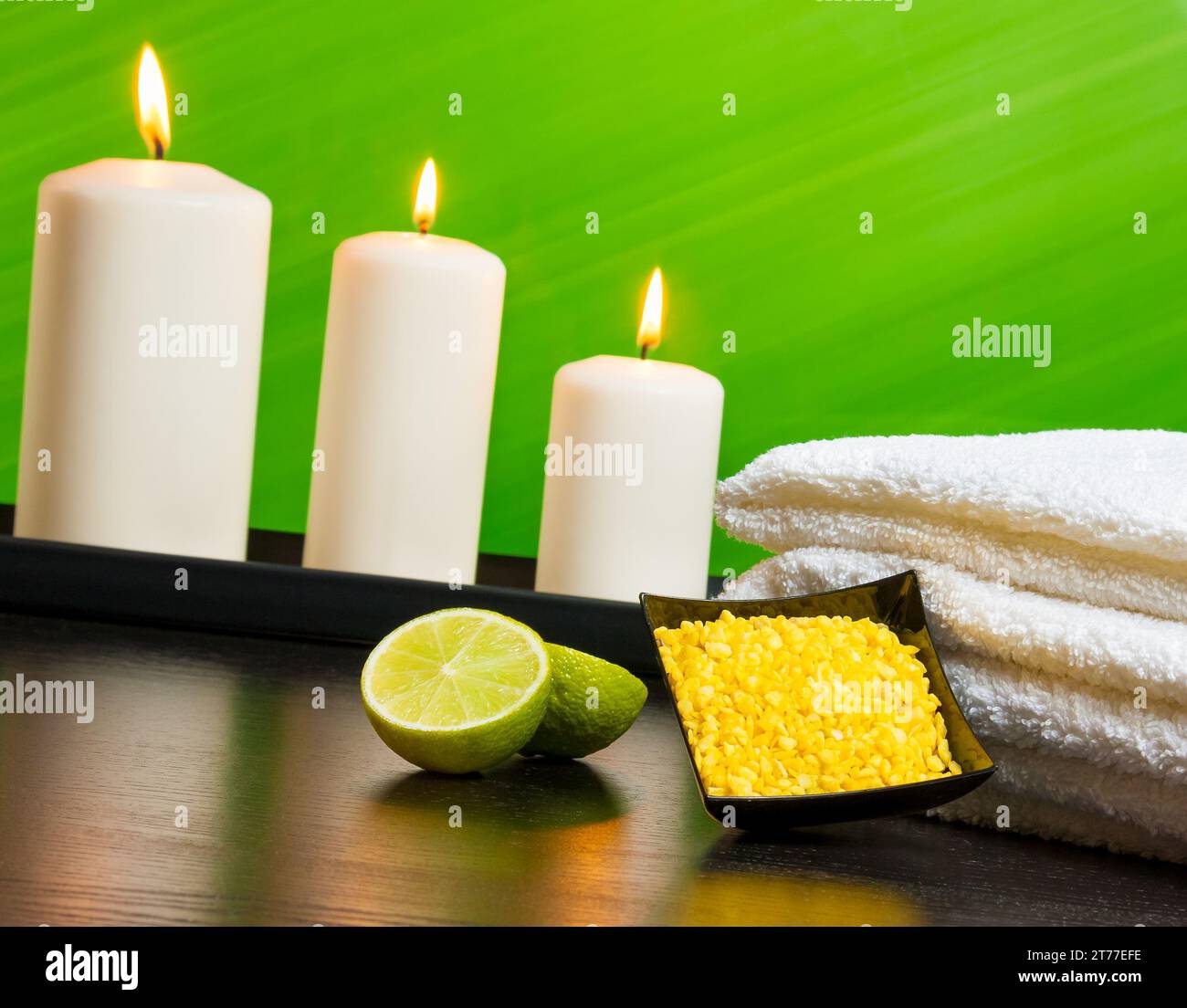 Spa massage border background with towel stacked sea salt candles and ...